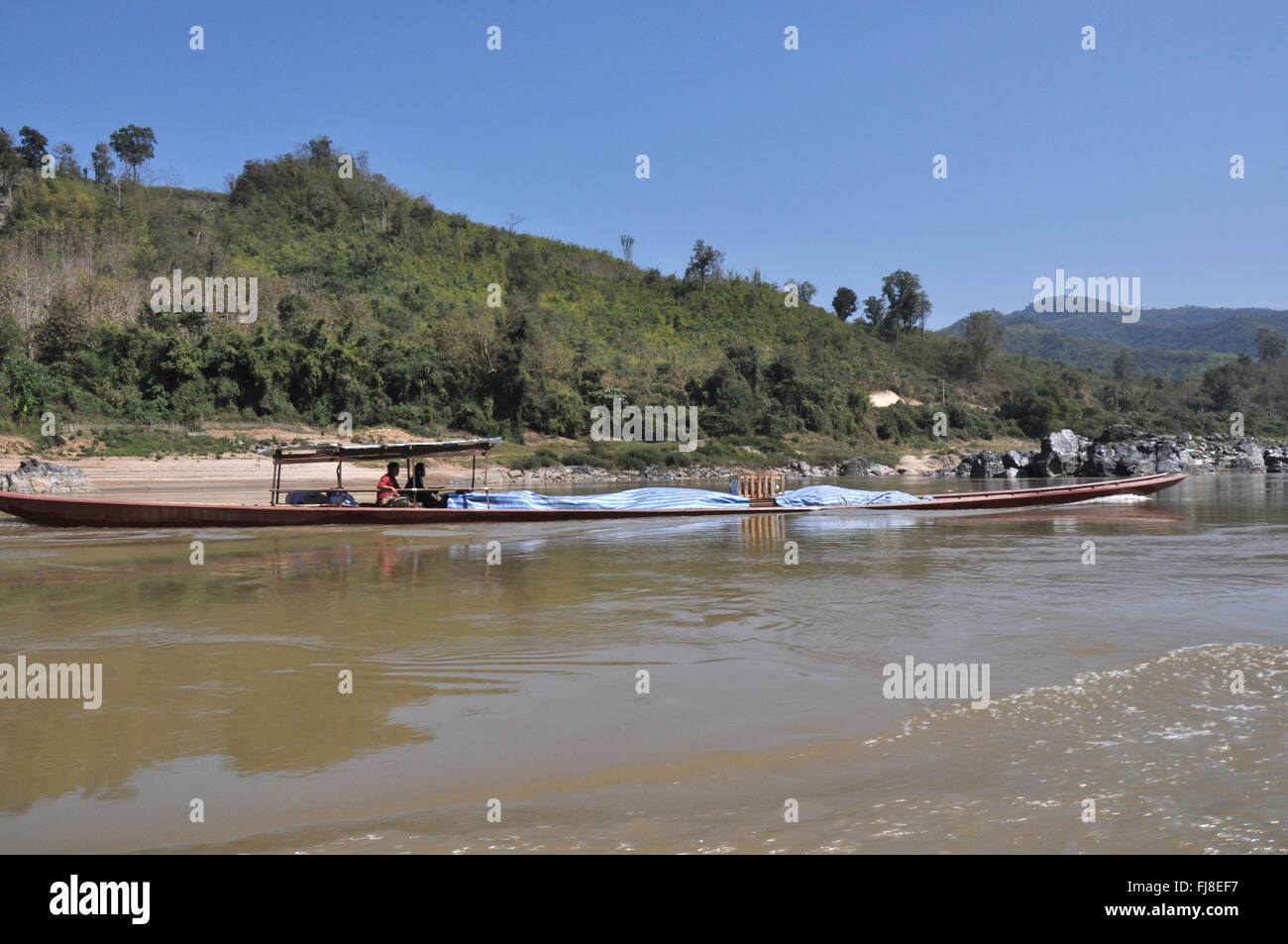 Longboat, Mekong river, Laos Stock Photo - Alamy
