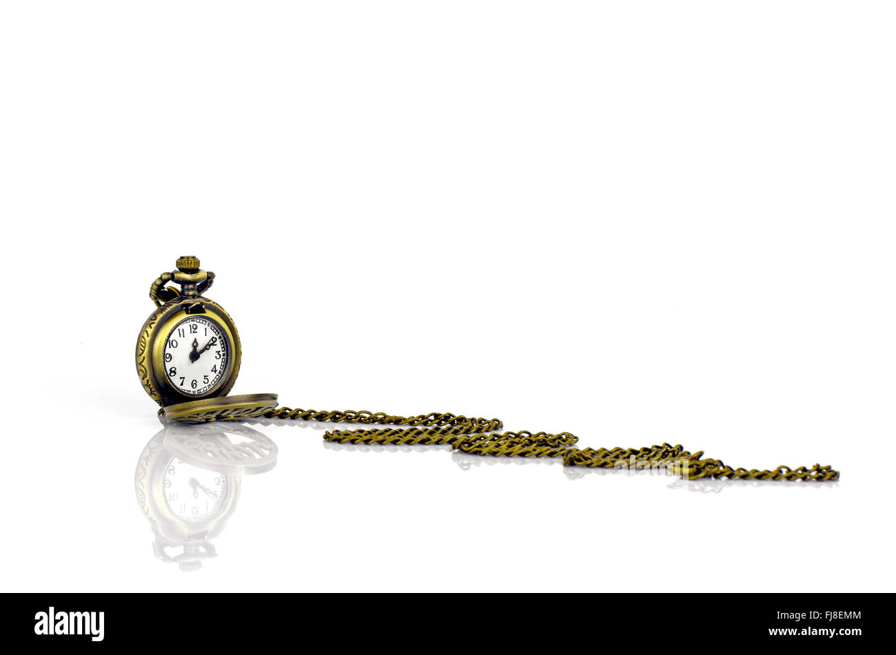 Vintage pocket watch on white background with reflection Stock Photo ...