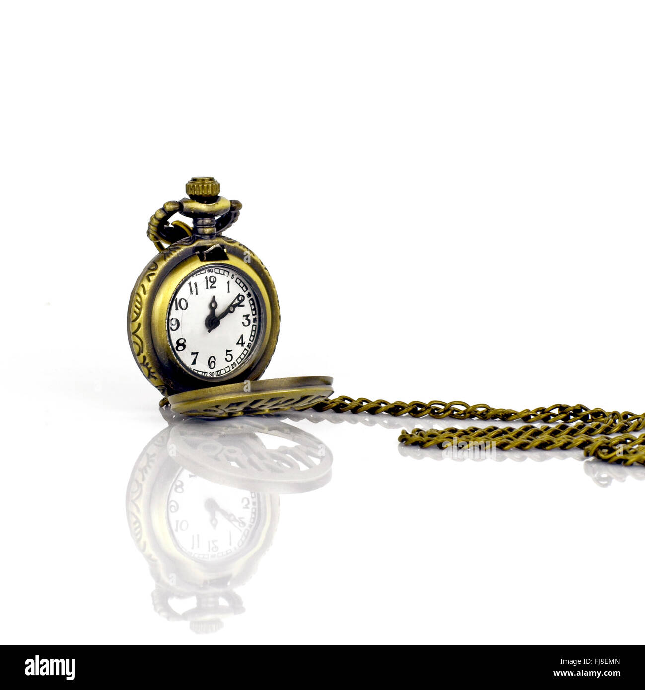 Vintage pocket watch on white background with reflection Stock Photo ...