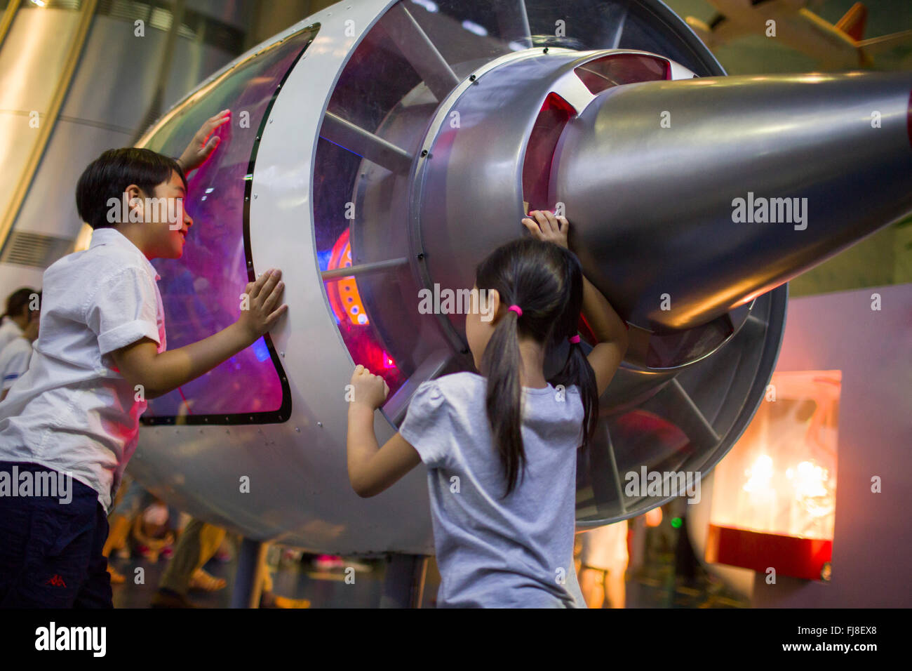 Chinese children in science and technology museum Stock Photo - Alamy