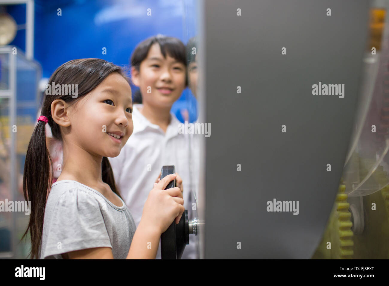 Chinese children in science and technology museum Stock Photo - Alamy