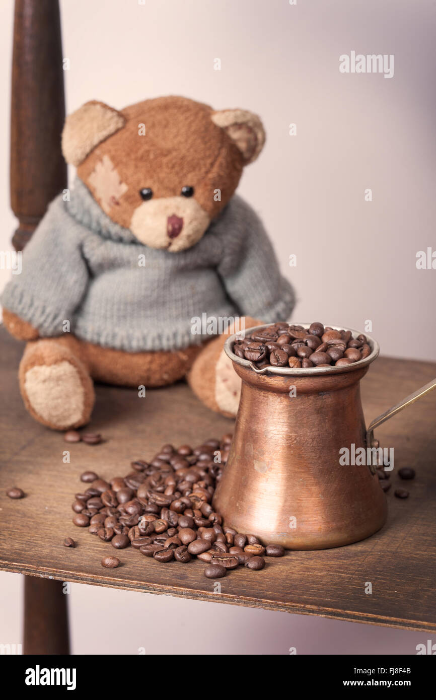 Teddy bear and coffee vintage toned picture with white background Stock ...