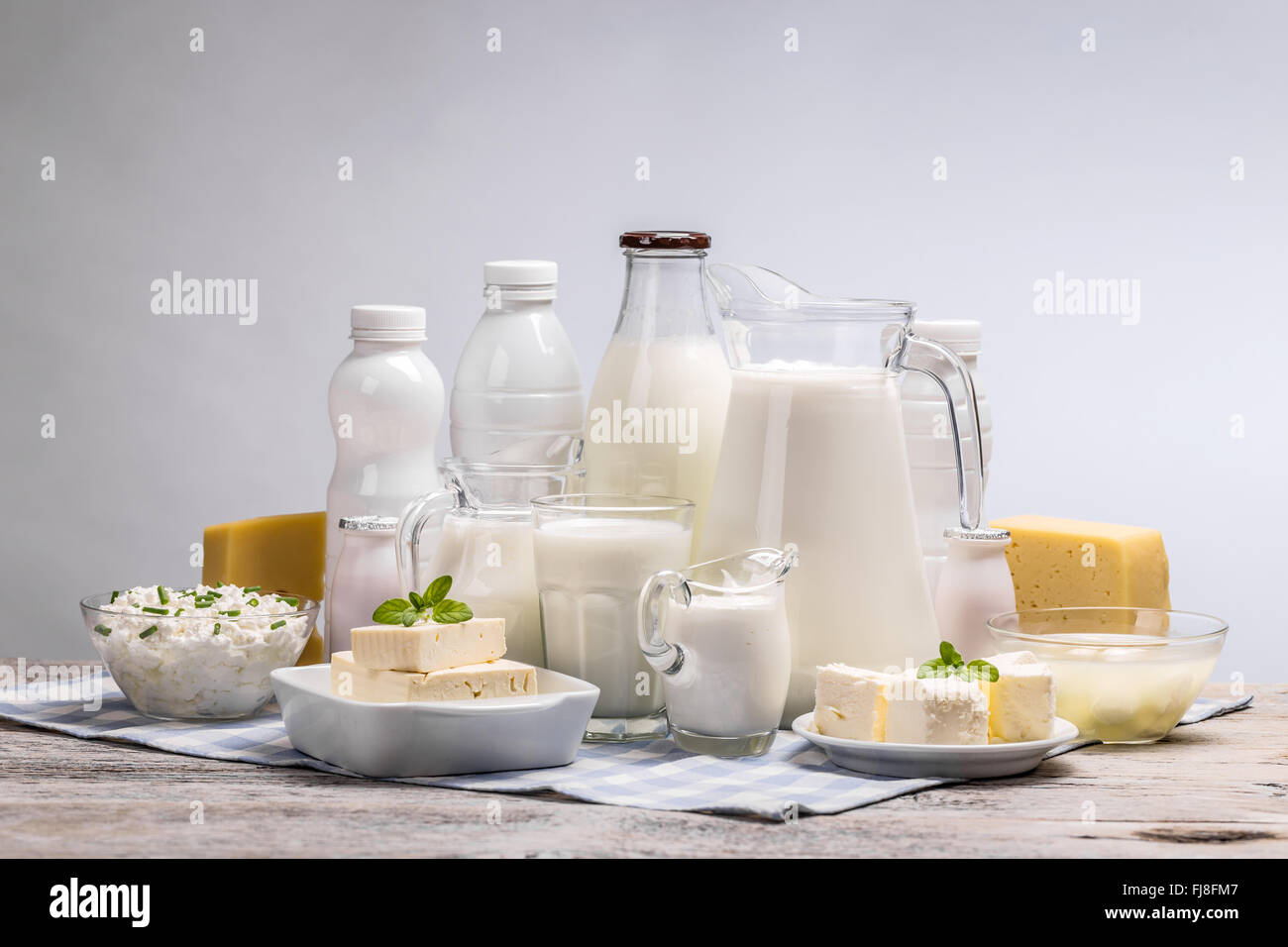 Dairy products on wooden table Stock Photo - Alamy