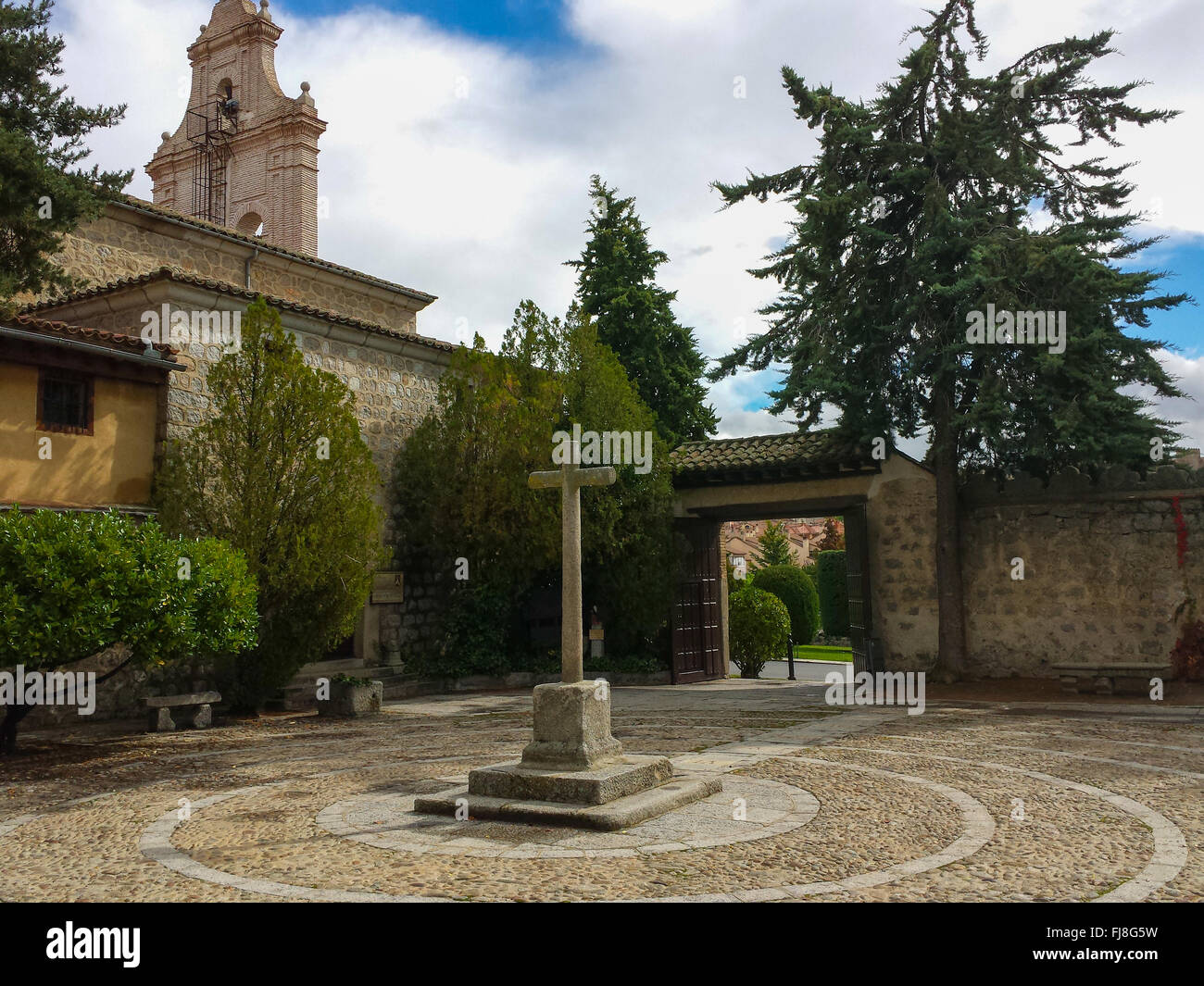Sculpture of a stone cross Stock Photo - Alamy