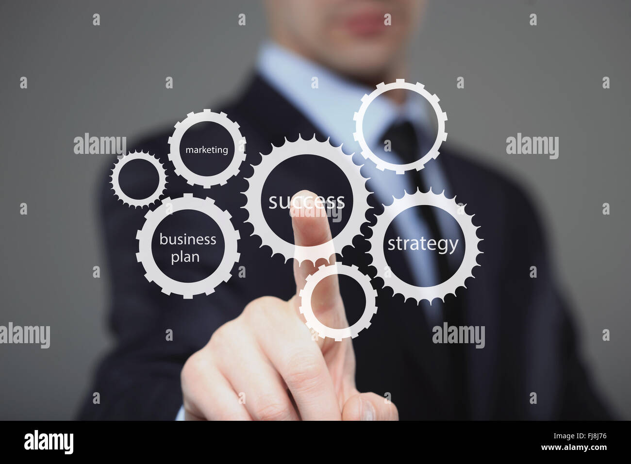 businessman hand pushing success button on a touch screen interface ...