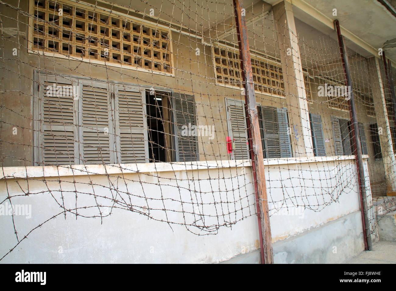 Prison gate with barbed wire hi-res stock photography and images - Alamy