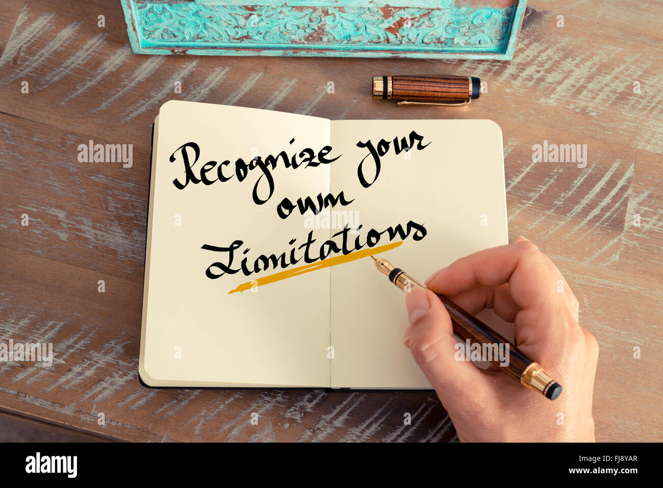 Handwritten text RECOGNIZE YOUR OWN LIMITATIONS as business concept ...