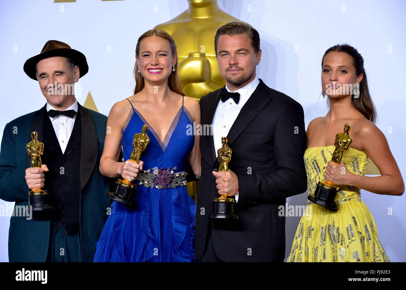 (L-R) Mark Rylance holds the Oscar for Actor in a Supporting Role for ...
