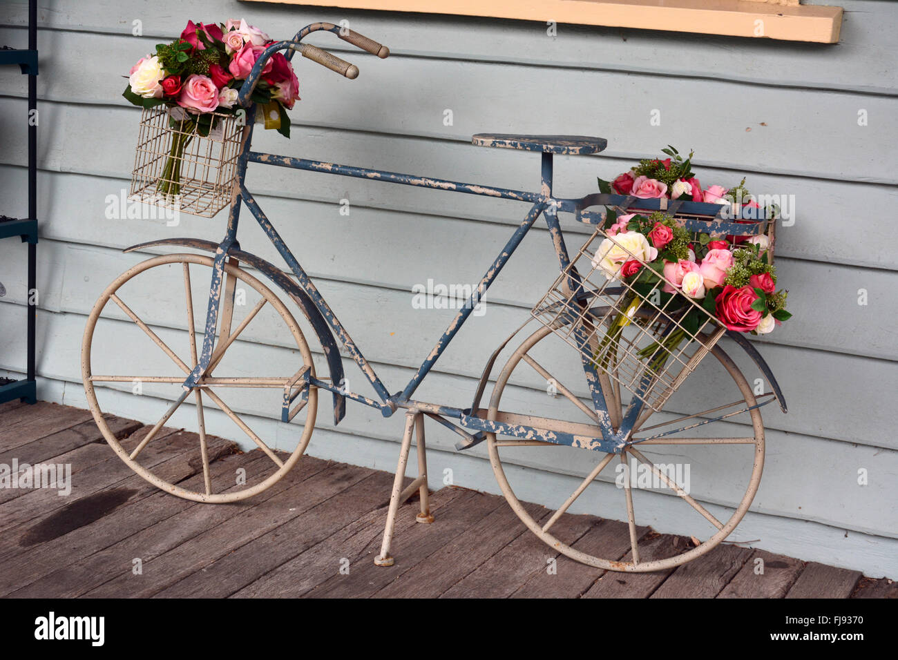 Bicycle with flowers Stock Photo - Alamy