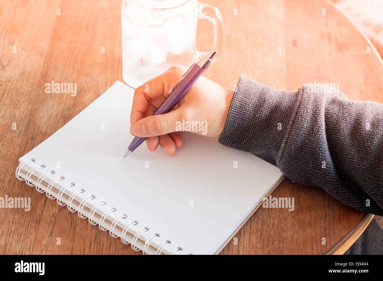 Hand woman writing notebook hi-res stock photography and images - Alamy