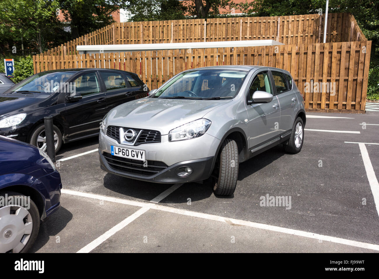 Inconsiderate parking in a car park, UK. THE SAME PICTURE WITHOUT ...