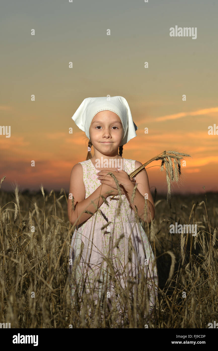 Cute little standing girl Stock Photo - Alamy