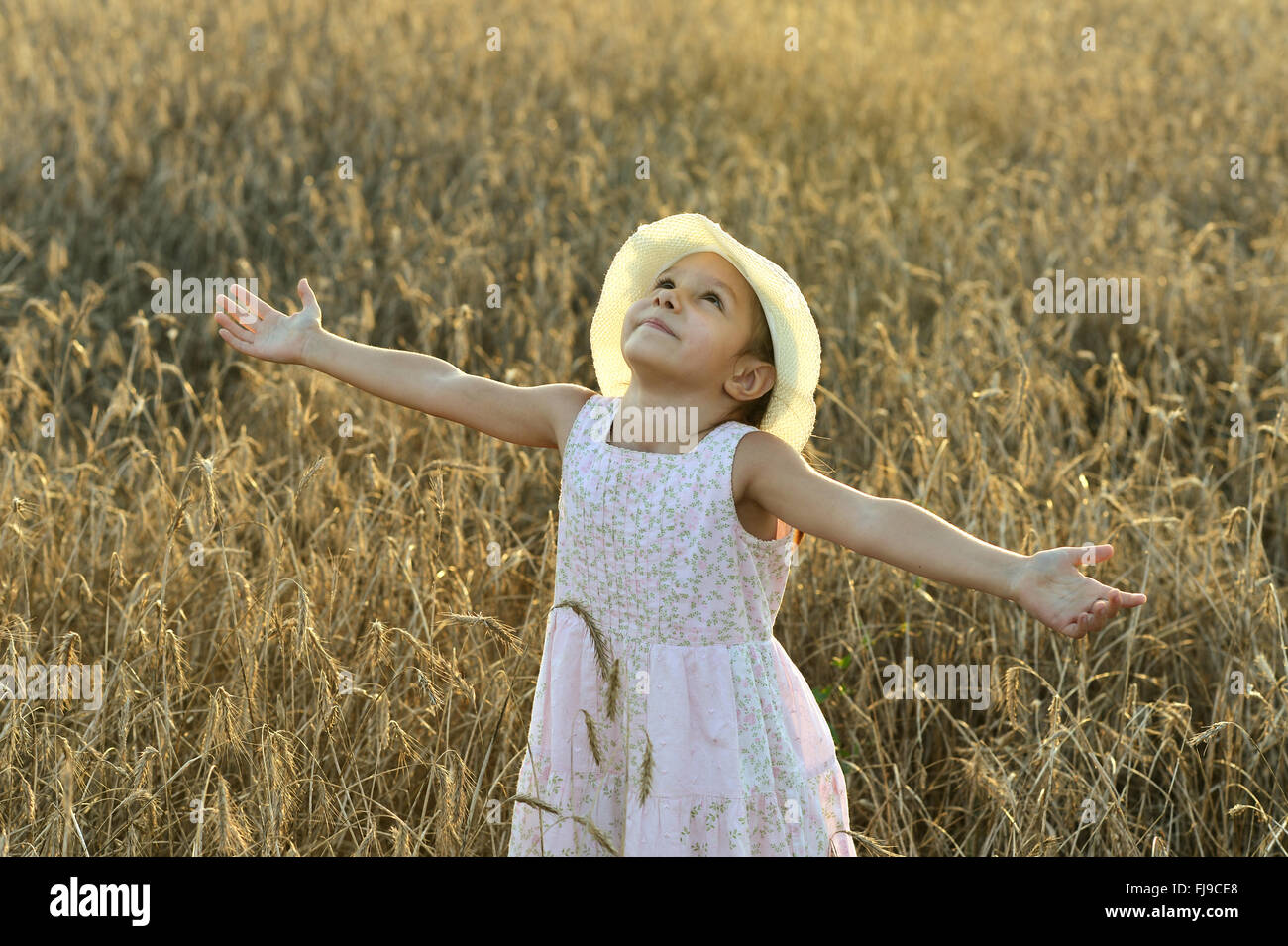 Cute little standing girl Stock Photo - Alamy