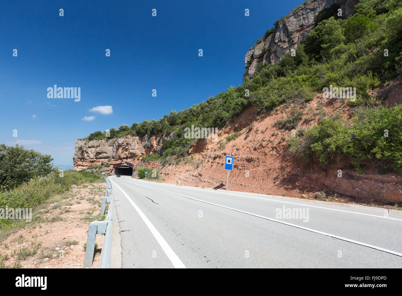 Rural road among rocks at summer Stock Photo - Alamy