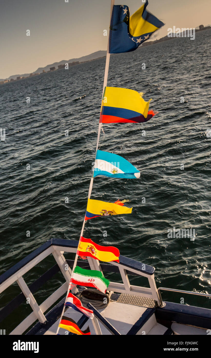 Some national flags fluttering on the rope Stock Photo - Alamy