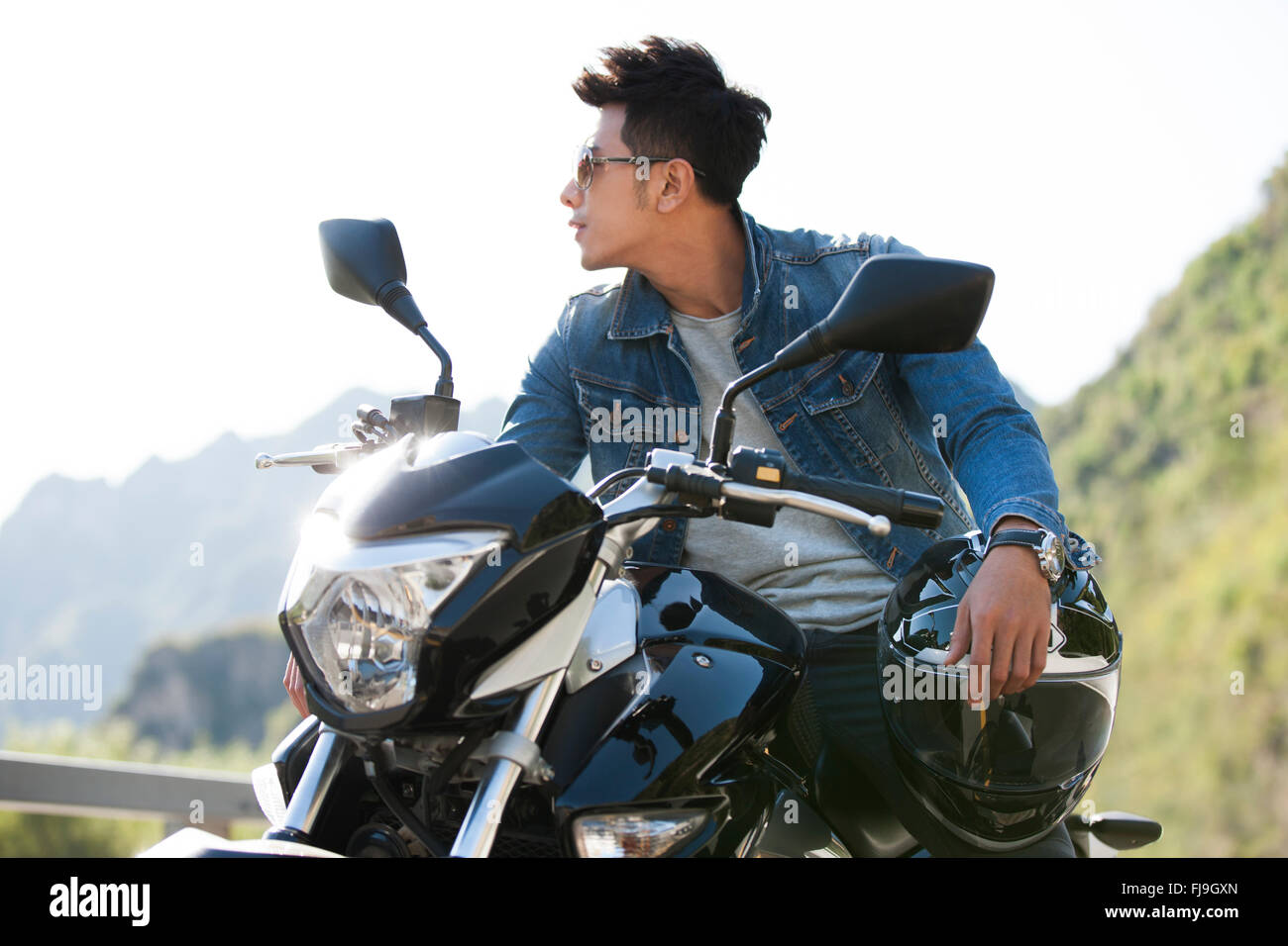 Chinese people sitting on motorcycle hi-res stock photography and ...