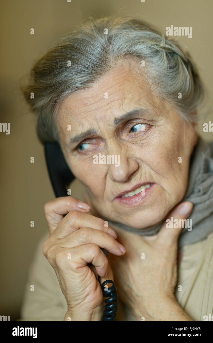 Senior woman calling Stock Photo - Alamy