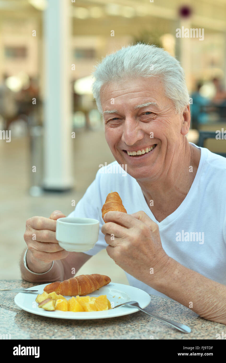 Attractive man breakfast hi-res stock photography and images - Alamy