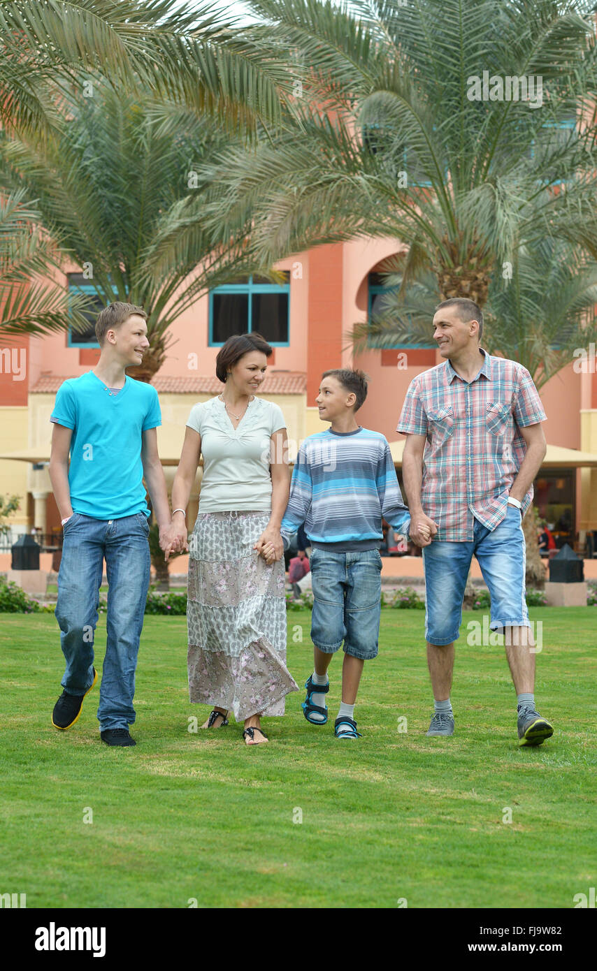 family in tropical ressort Stock Photo - Alamy