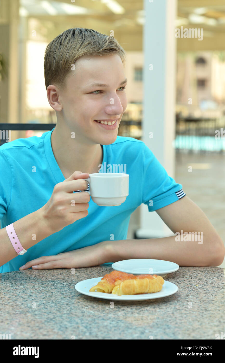 boy drinking coffee Stock Photo - Alamy