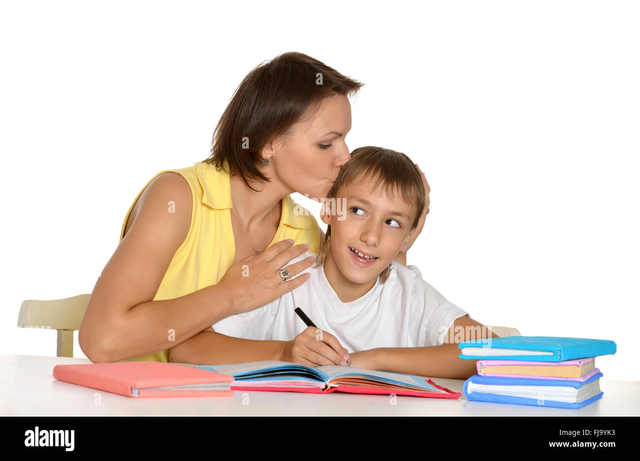 Mother helping her son Stock Photo - Alamy