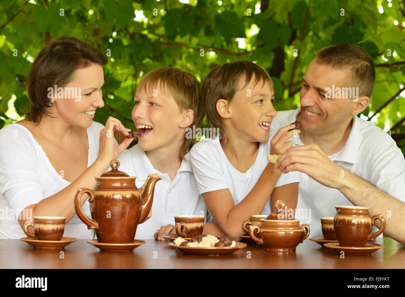 family drinking tea Stock Photo - Alamy