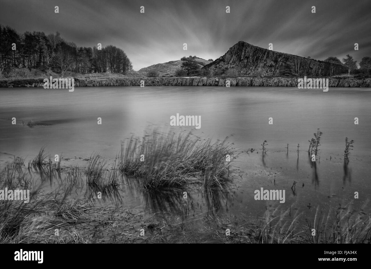 Cawfields Quarry. Taken from a low angle to include the grasses in the ...