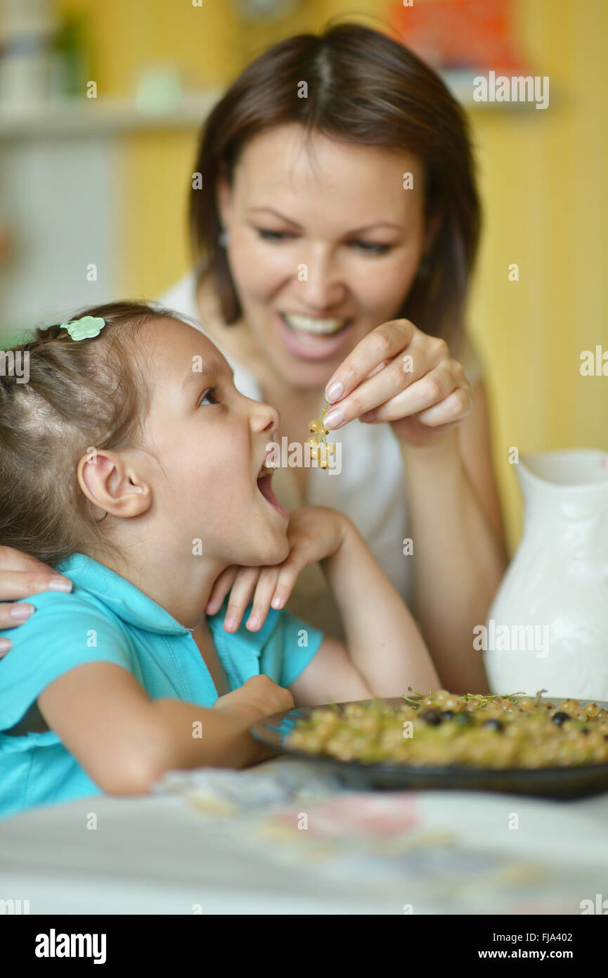 Smiling young mother Stock Photo - Alamy