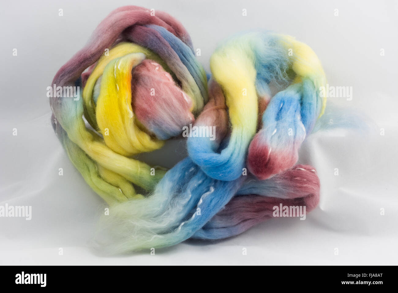 Coloured hand spun wool Stock Photo - Alamy