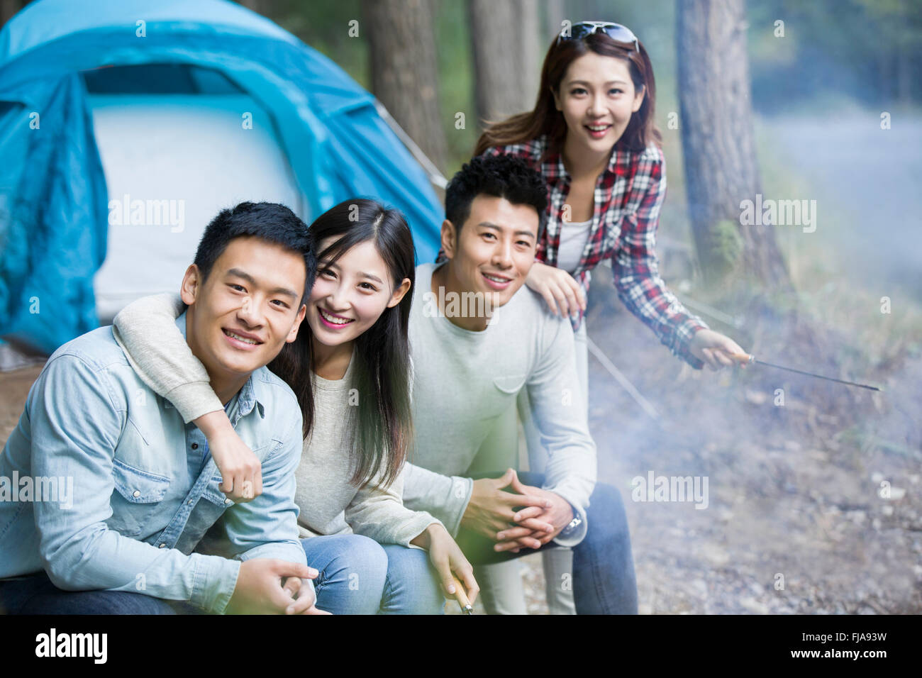 Happy young Chinese friends Stock Photo - Alamy