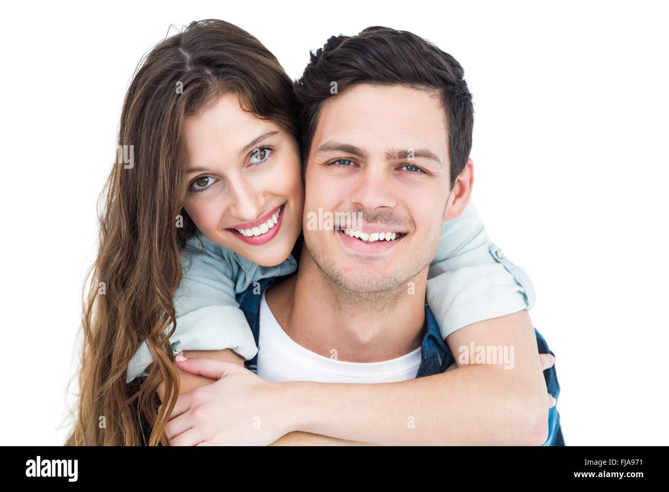 Cute couple embracing and looking the camera Stock Photo - Alamy