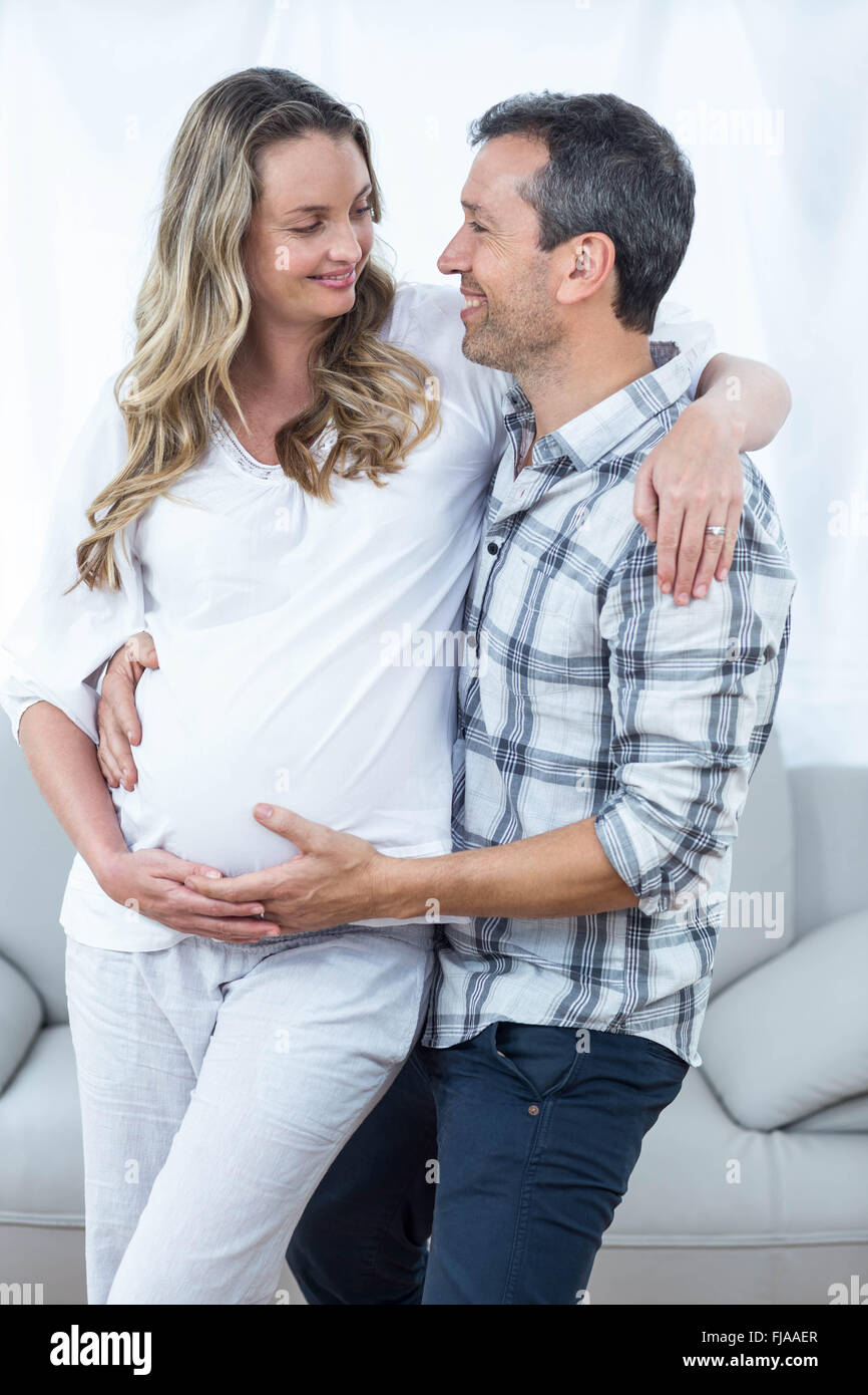 Happy couple expecting baby Stock Photo - Alamy