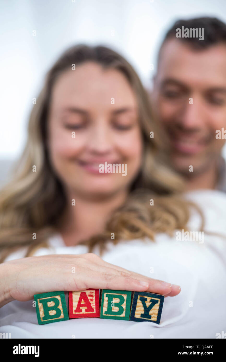 Pregnant woman with baby cubes Stock Photo - Alamy