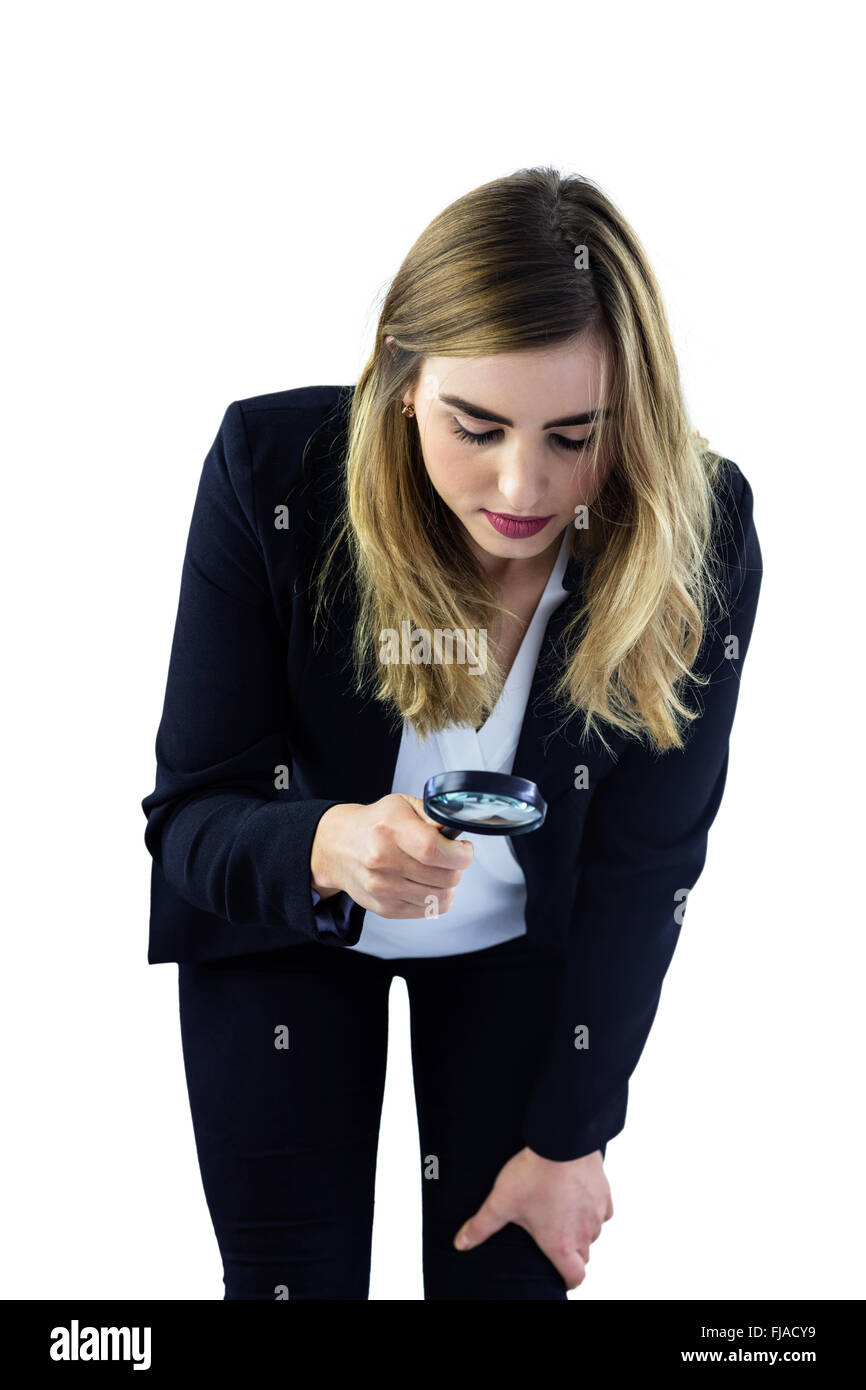 Woman using magnifying glass hi-res stock photography and images - Alamy