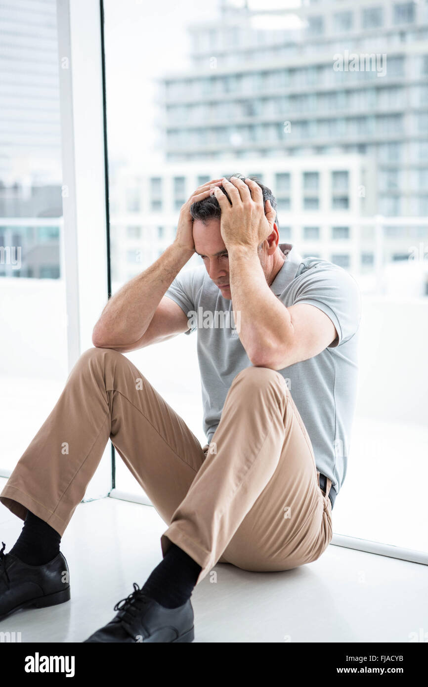 Man sitting down and thinking hi-res stock photography and images - Alamy