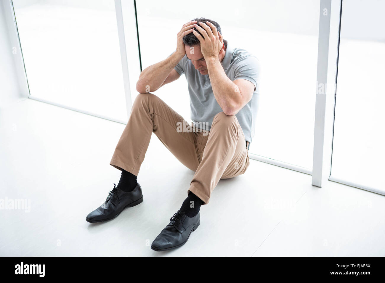Man sitting down and thinking hi-res stock photography and images - Alamy