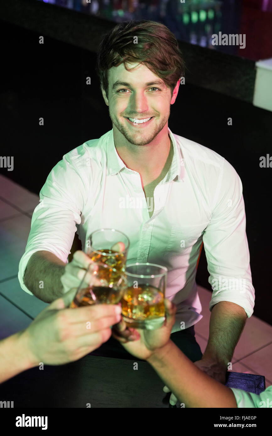 Happy man toasting his glass of beer Stock Photo - Alamy