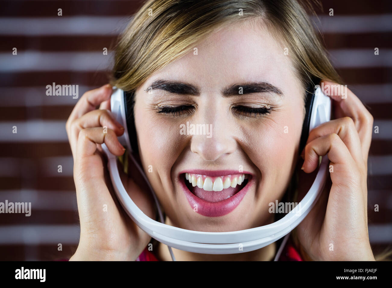 Beautiful woman having fun listening hi-res stock photography and images - Alamy