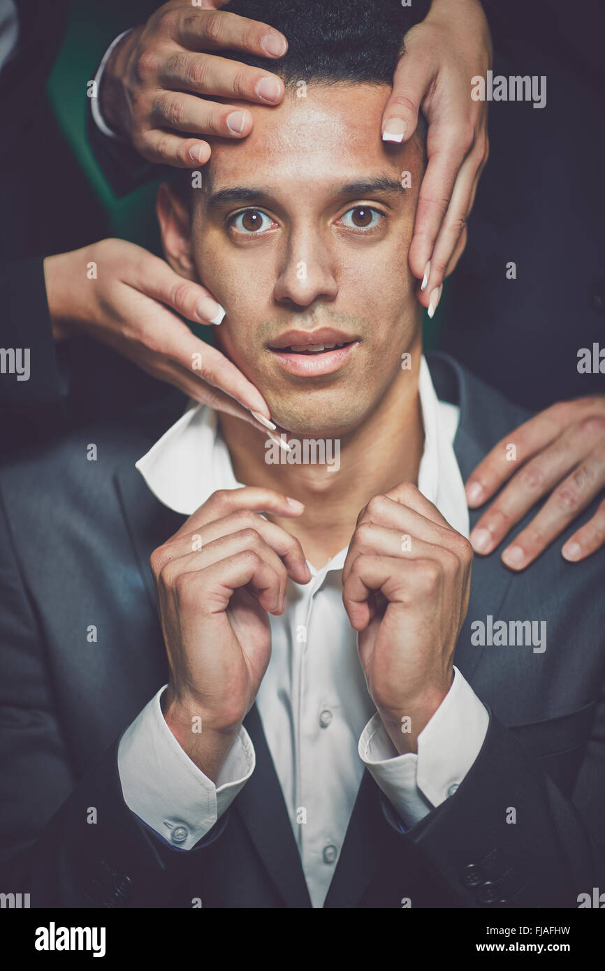 Confused businessman looking at camera Stock Photo - Alamy