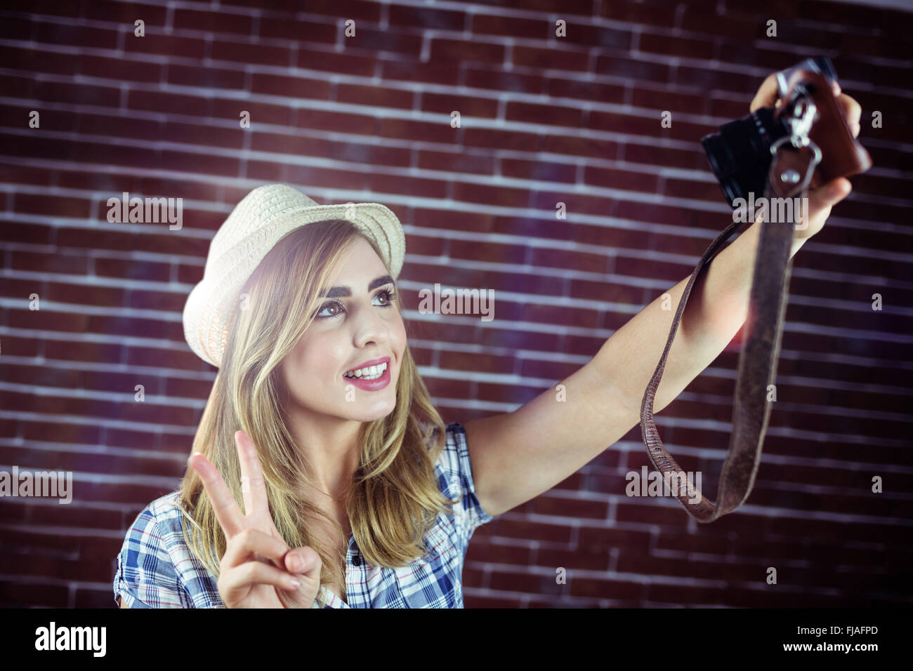 Woman taking pictures Stock Photo - Alamy