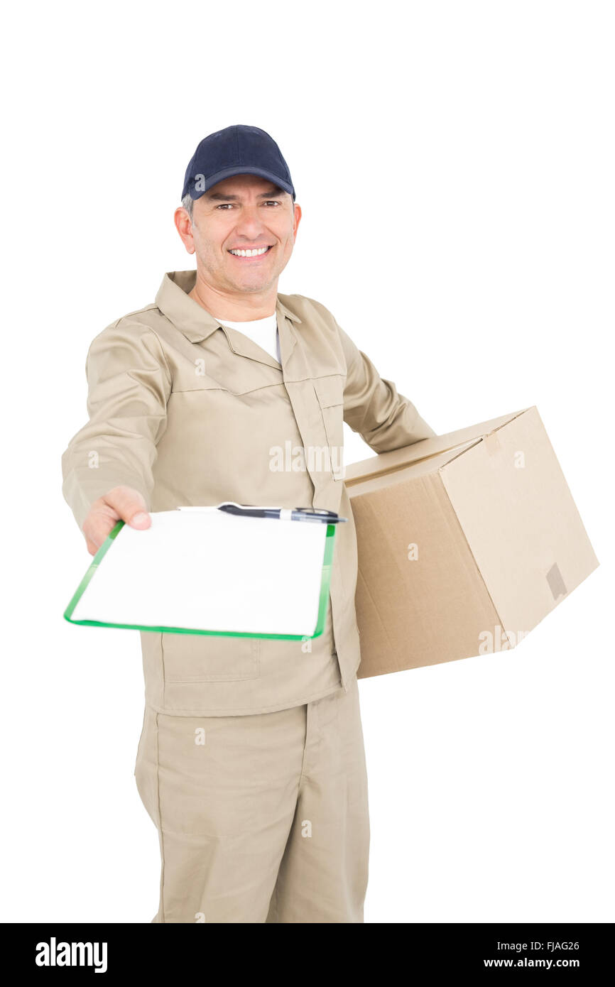 Delivery man with package giving clipboard for signature Stock Photo ...
