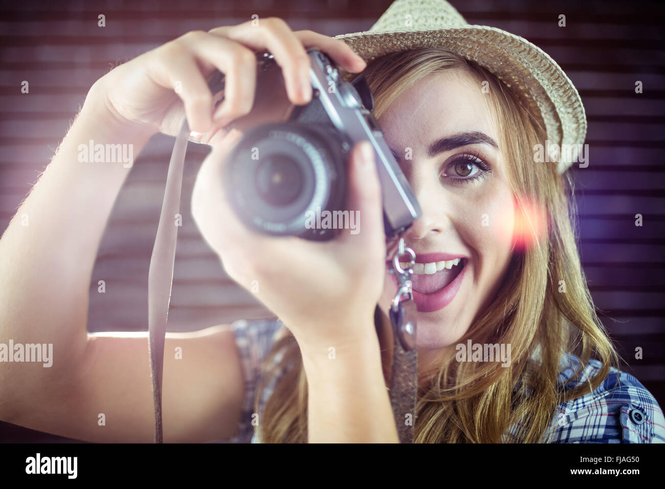 Blonde woman taking pictures digital hi-res stock photography and ...