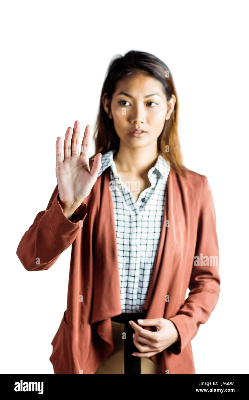 Serious businesswoman showing her hand Stock Photo - Alamy