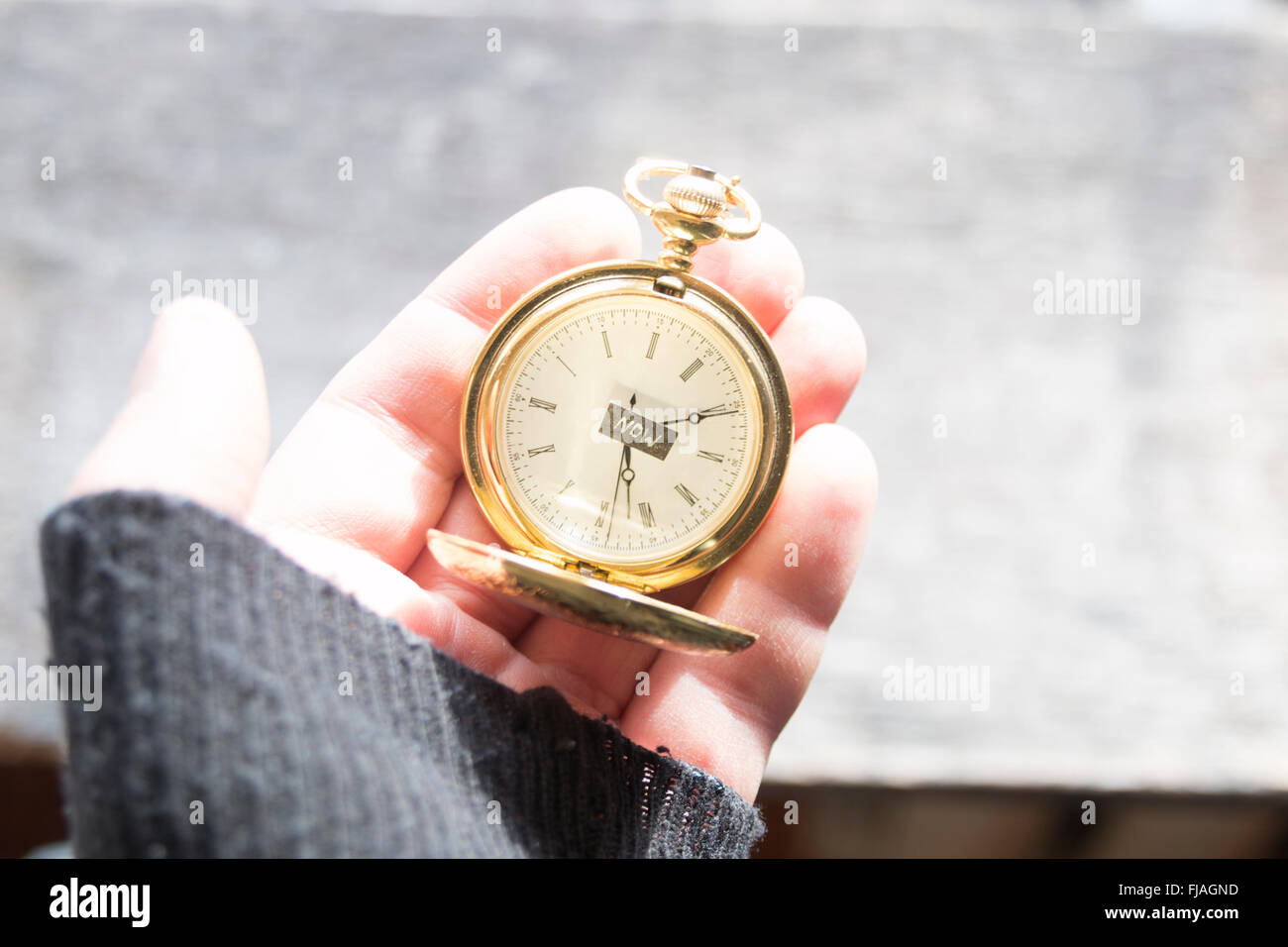 Now, Time concept. Text and pocket watch Stock Photo - Alamy