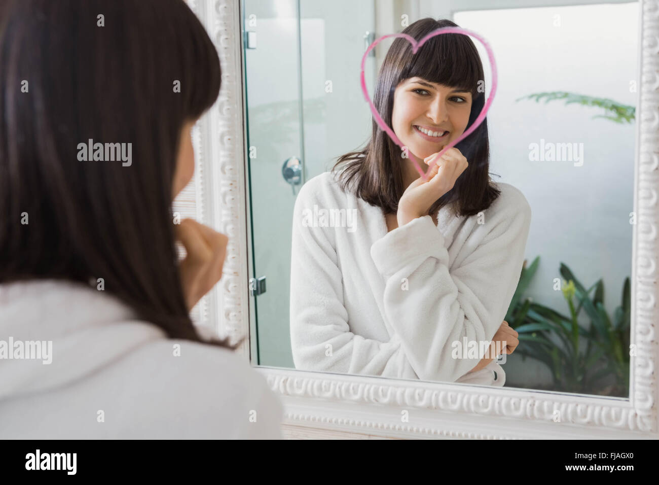 Beautiful young woman reflection in mirror Stock Photo - Alamy