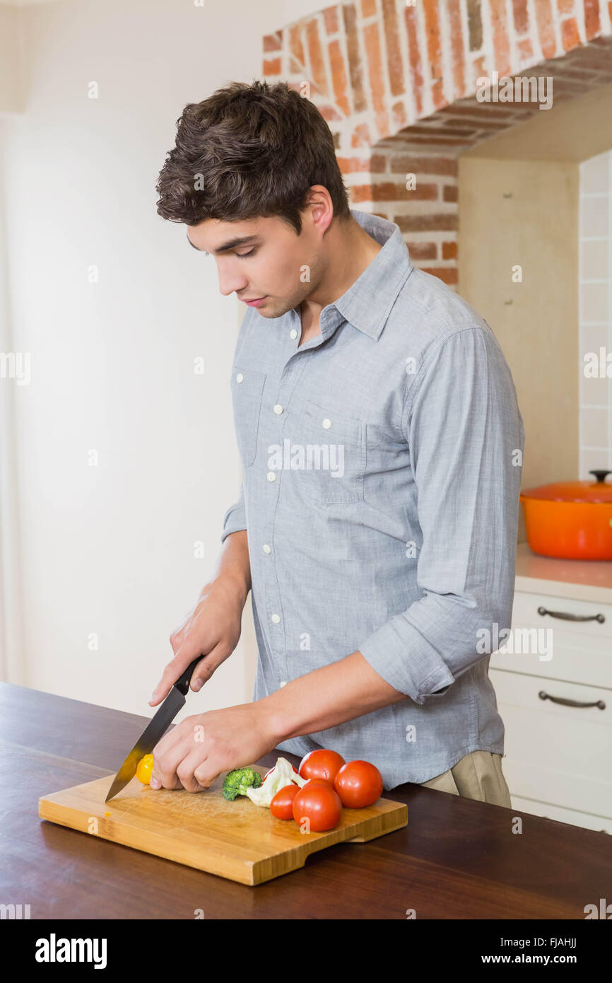 Cutting vegetables in kitchen hi-res stock photography and images - Alamy