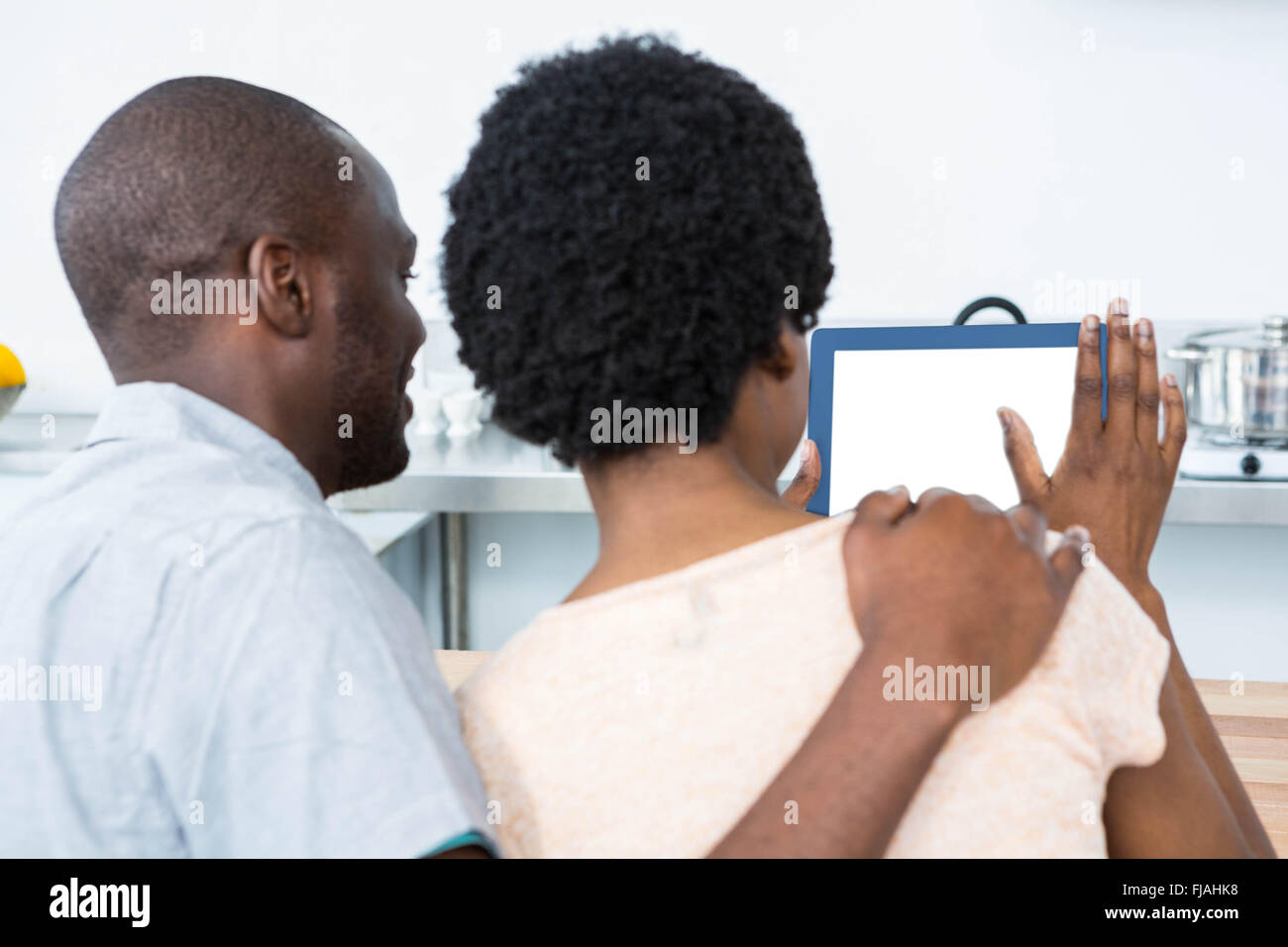Pregnant black couple using hi-res stock photography and images - Alamy