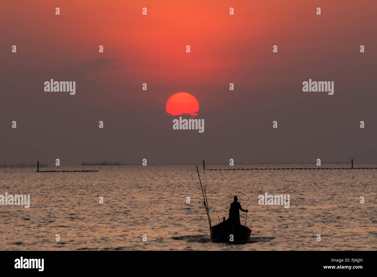 Beautiful red sunset over the ocean Stock Photo - Alamy