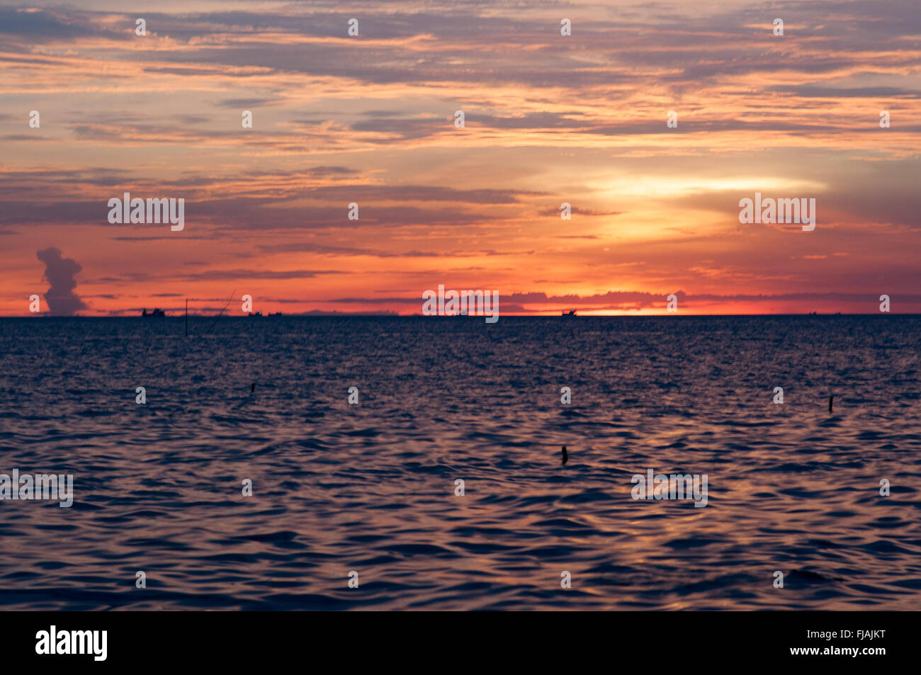 Beautiful red sunset over the ocean Stock Photo - Alamy