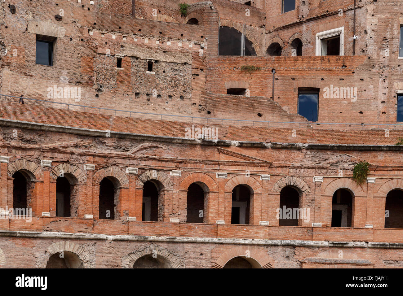 Close up detailed view of an ancient forum structure with orange bricks ...